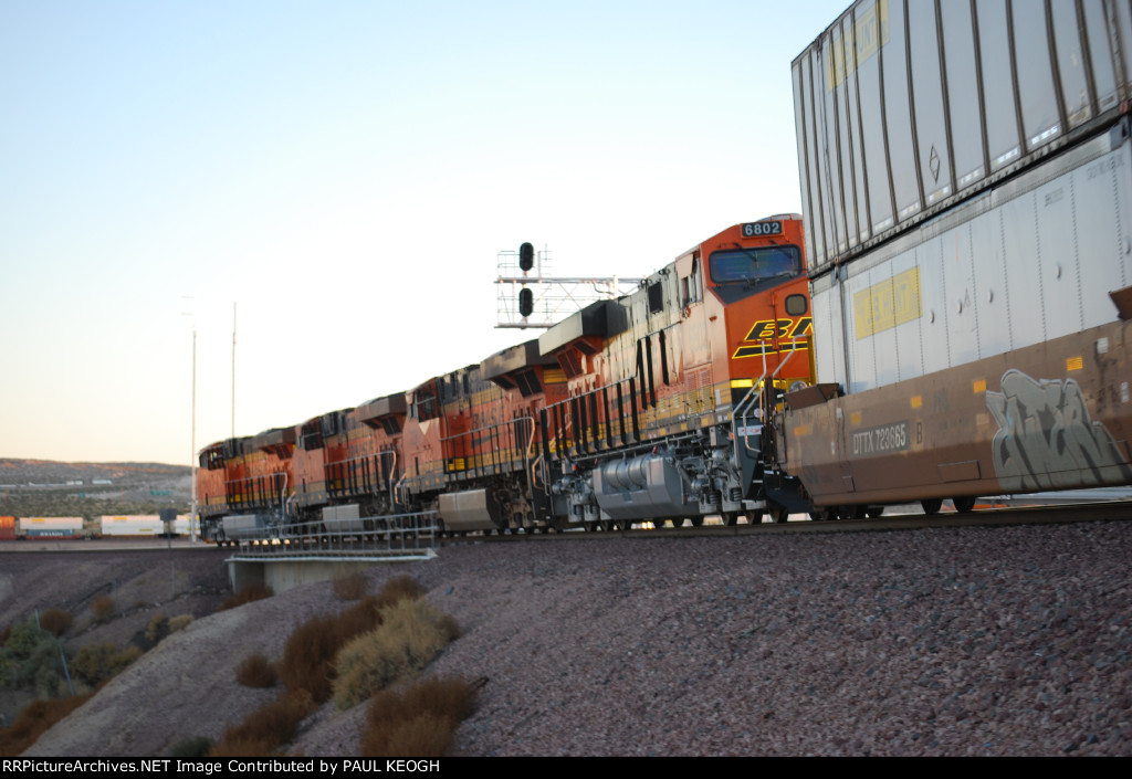 BNSF 6802 with Her Sisters BNSF 6894 and BNSF 6808 (Lead Unit) pass me by as they enter the BNSF ...
